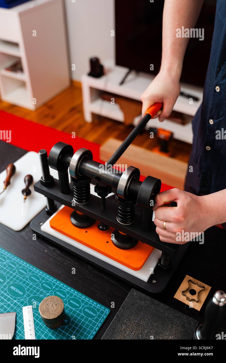 Craftsman uses press machine hi-res stock photography and images - Alamy