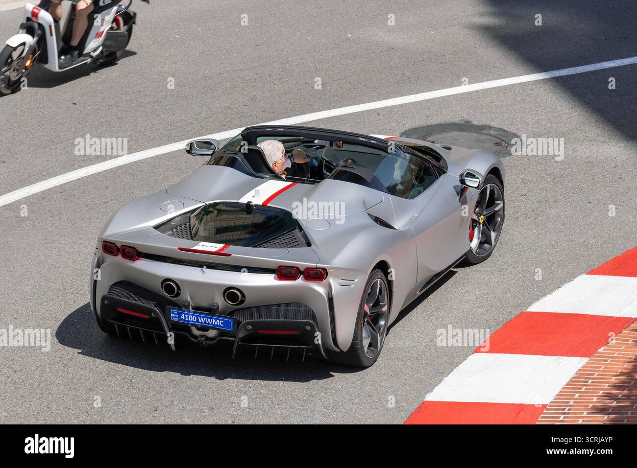 Monte Carlo, Monaco - View on a matte grey Ferrari SF90 Spider driving ...
