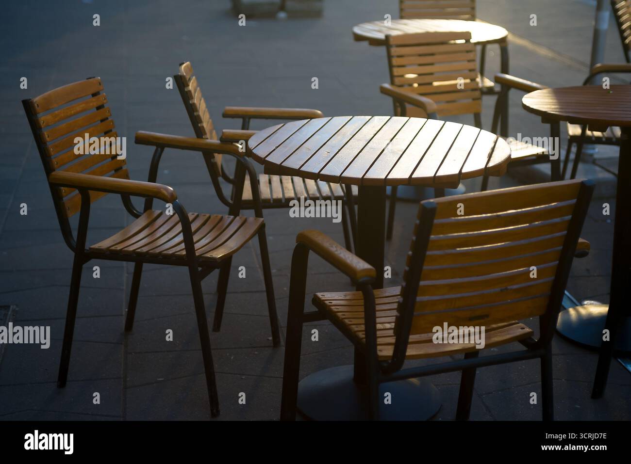 Empty restaurant patio tables chairs hi-res stock photography and ...