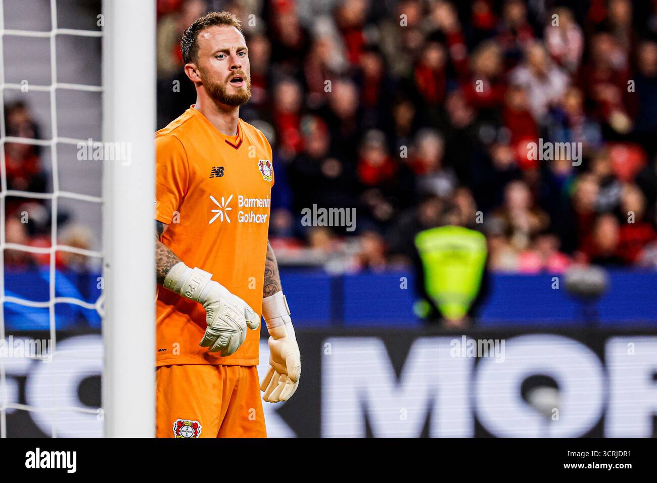 Goalkeeper Mark Flekken of Bayer 04 Leverkusen looks on during the UEFA ...