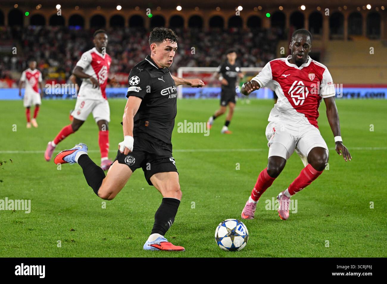 Manchester City's Phil Foden crosses the ball during the Champions League opening phase soccer ...