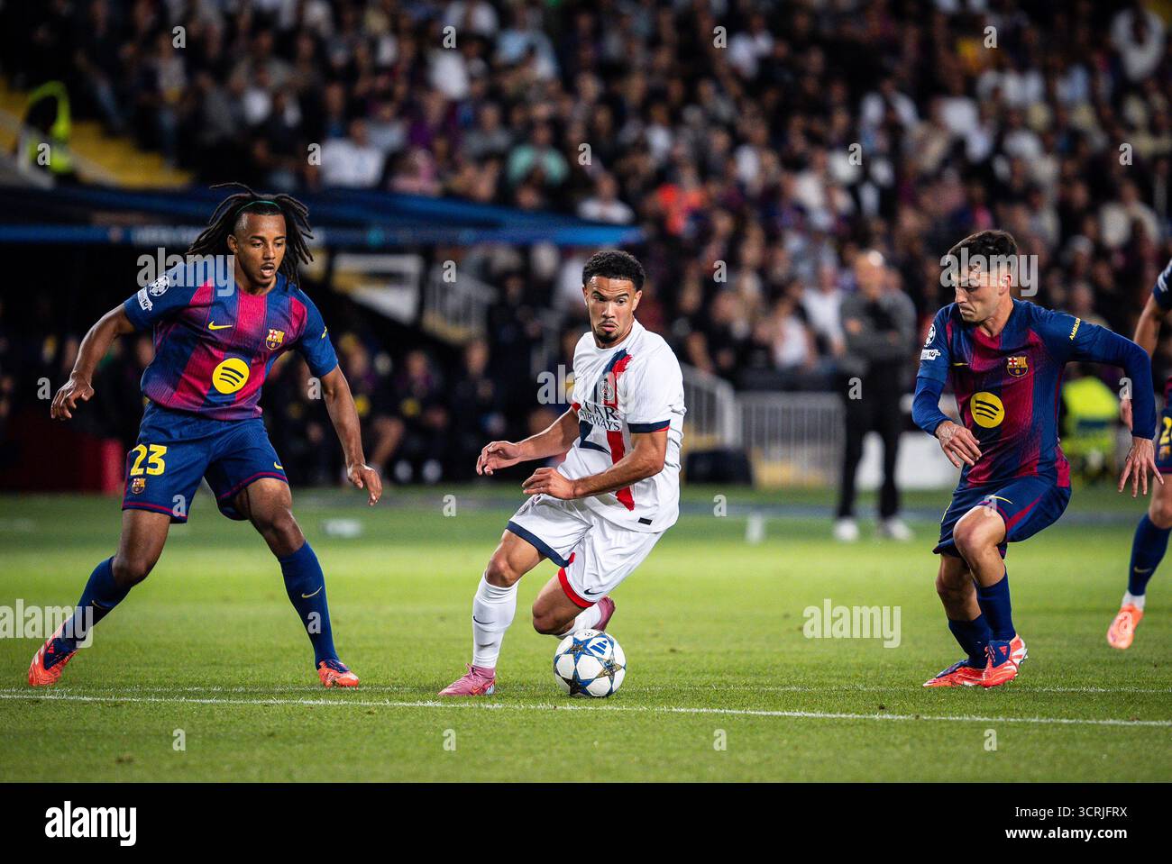 Jules KOUNDE of Barcelona, Warren ZAIRE-EMERY of PSG and Pedro GONZALEZ ...