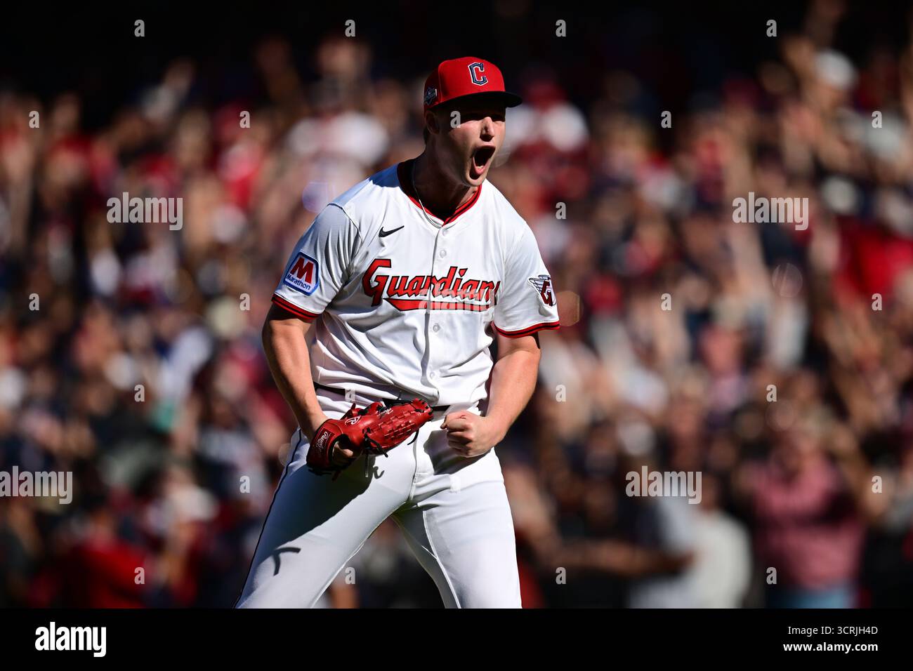 Cleveland Guardians pitcher Tim Herrin reacts after striking out ...
