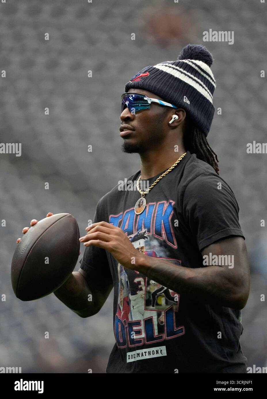 Houston Texans safety Calen Bullock warms up before an NFL football ...