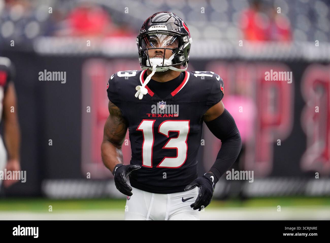 Houston Texans wide receiver Christian Kirk warms up before an NFL ...