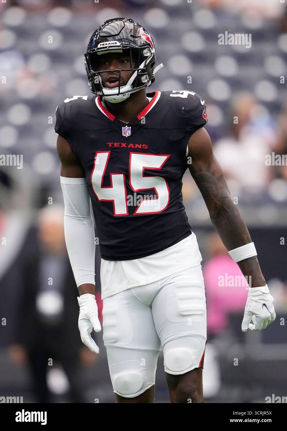 Houston Texans linebacker E.J. Speed warms up before an NFL football ...