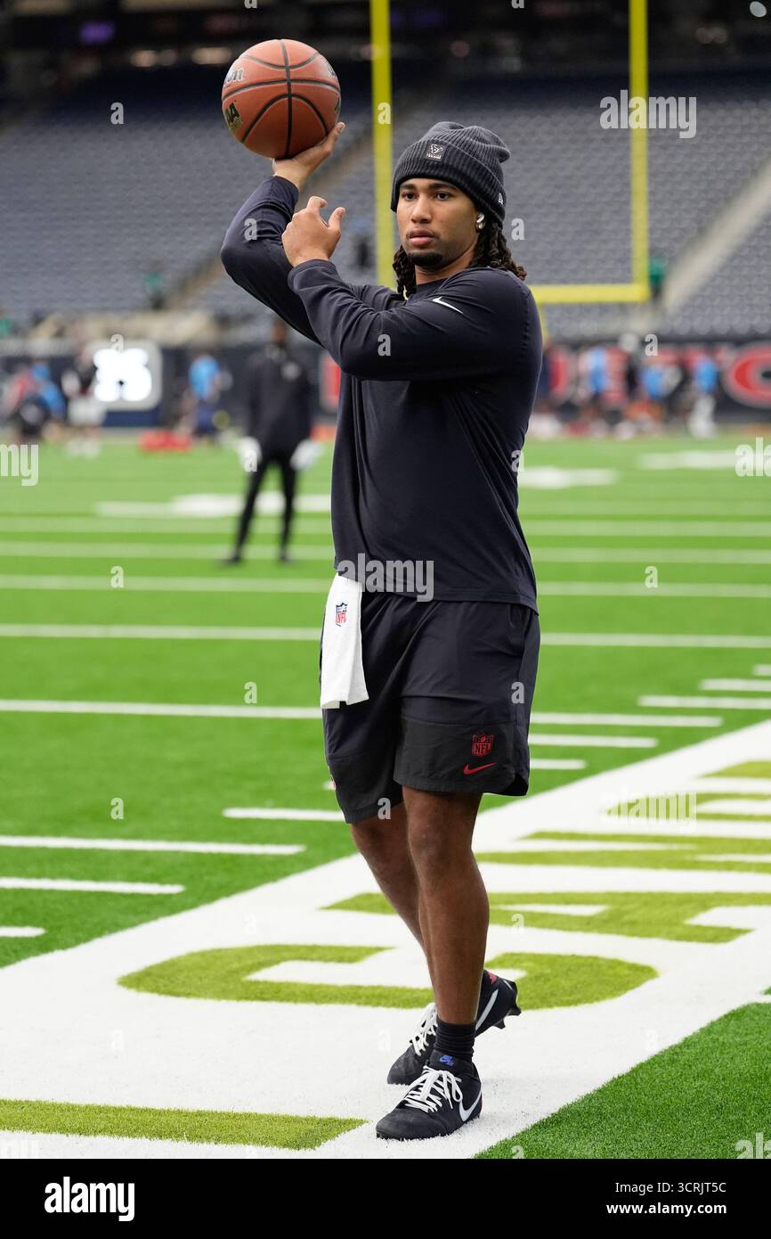 Houston Texans quarterback C.J. Stroud warms up before an NFL football ...