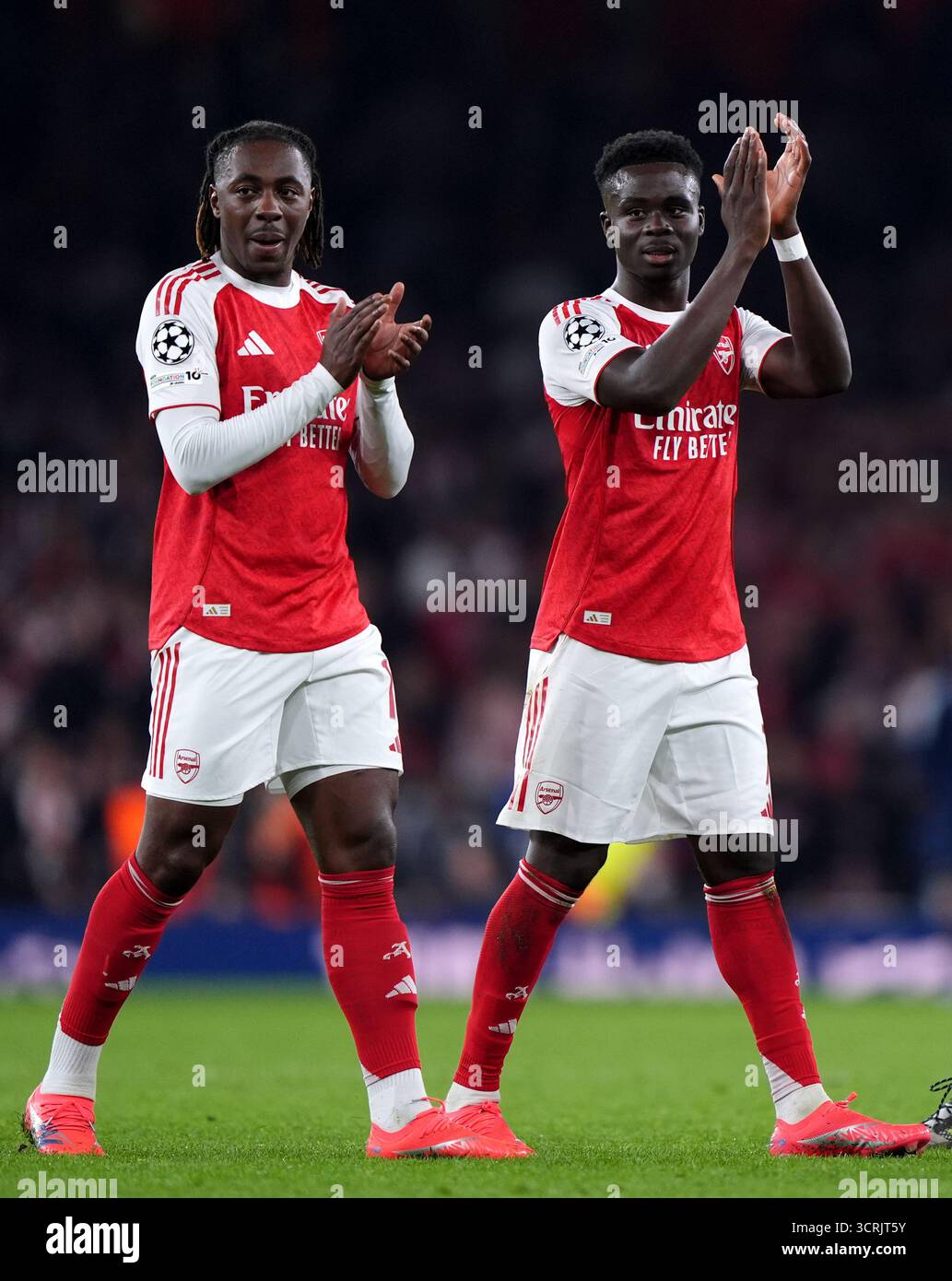 Arsenal's Eberechi Eze (left) and Bukayo Saka applaud the fans after ...