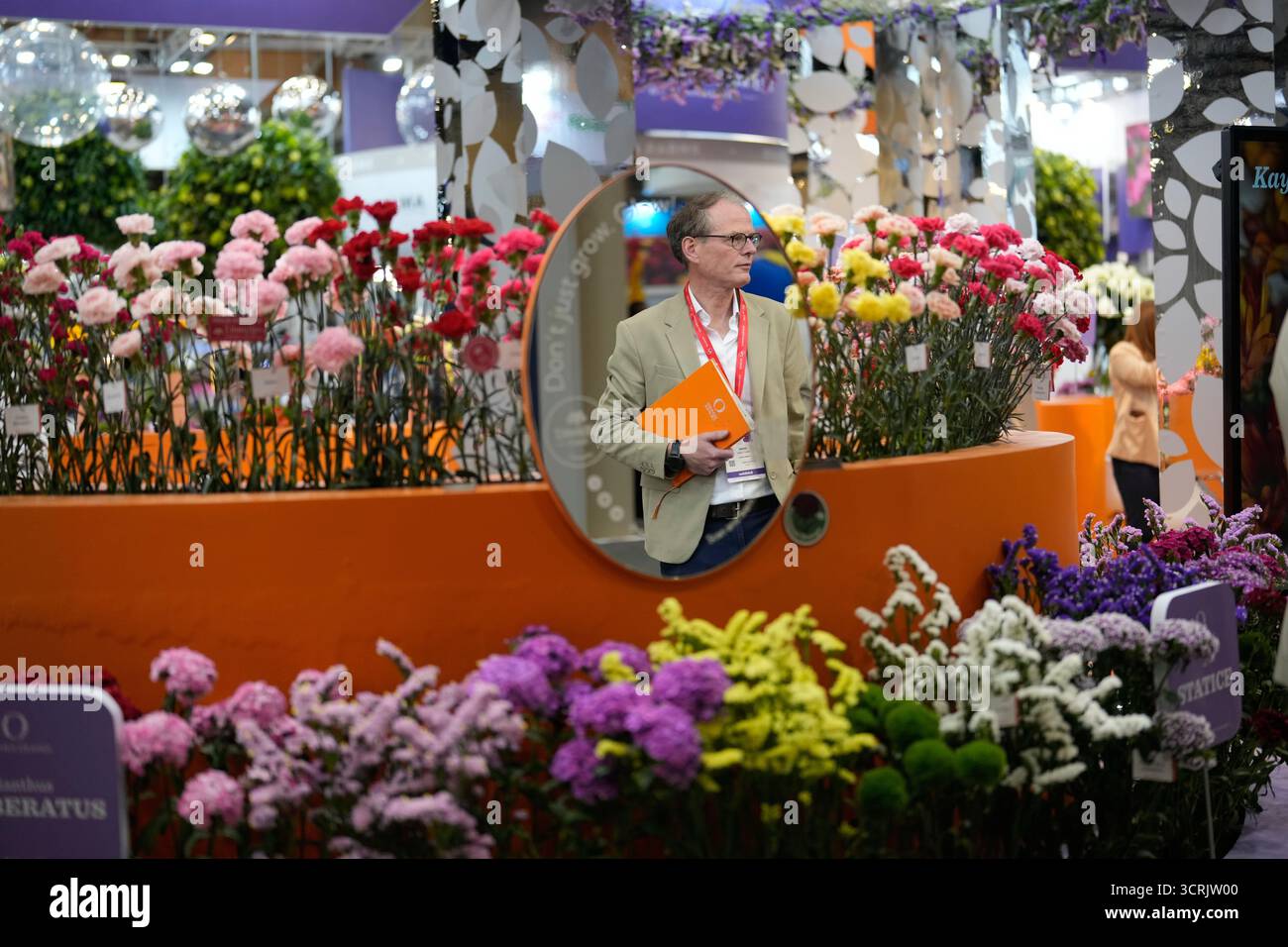 A visitor tours Proflora, a biennial fair where international flower ...