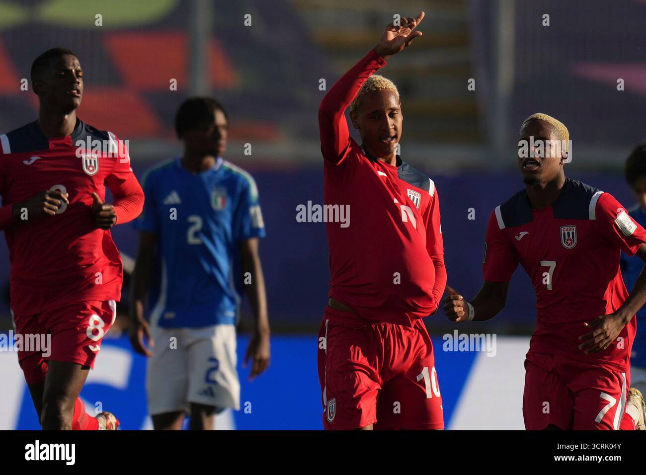 Cuba's Michael Camejo (10) celebrates scoring his side's first goal ...