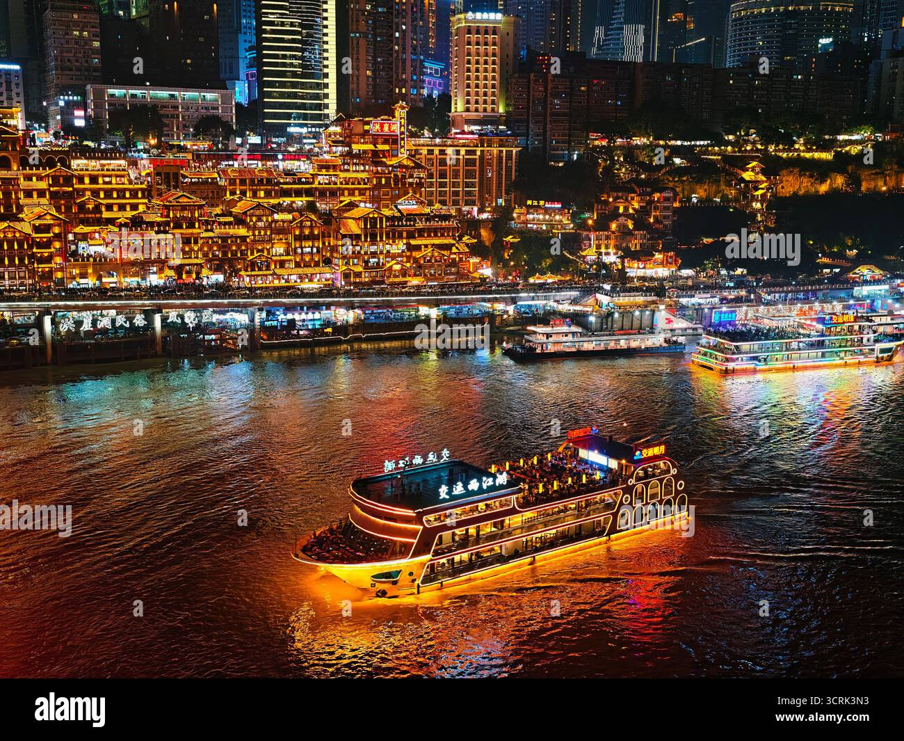 CHONGQING, CHINA - OCTOBER 1, 2025 - Tourists take advantage of the ...
