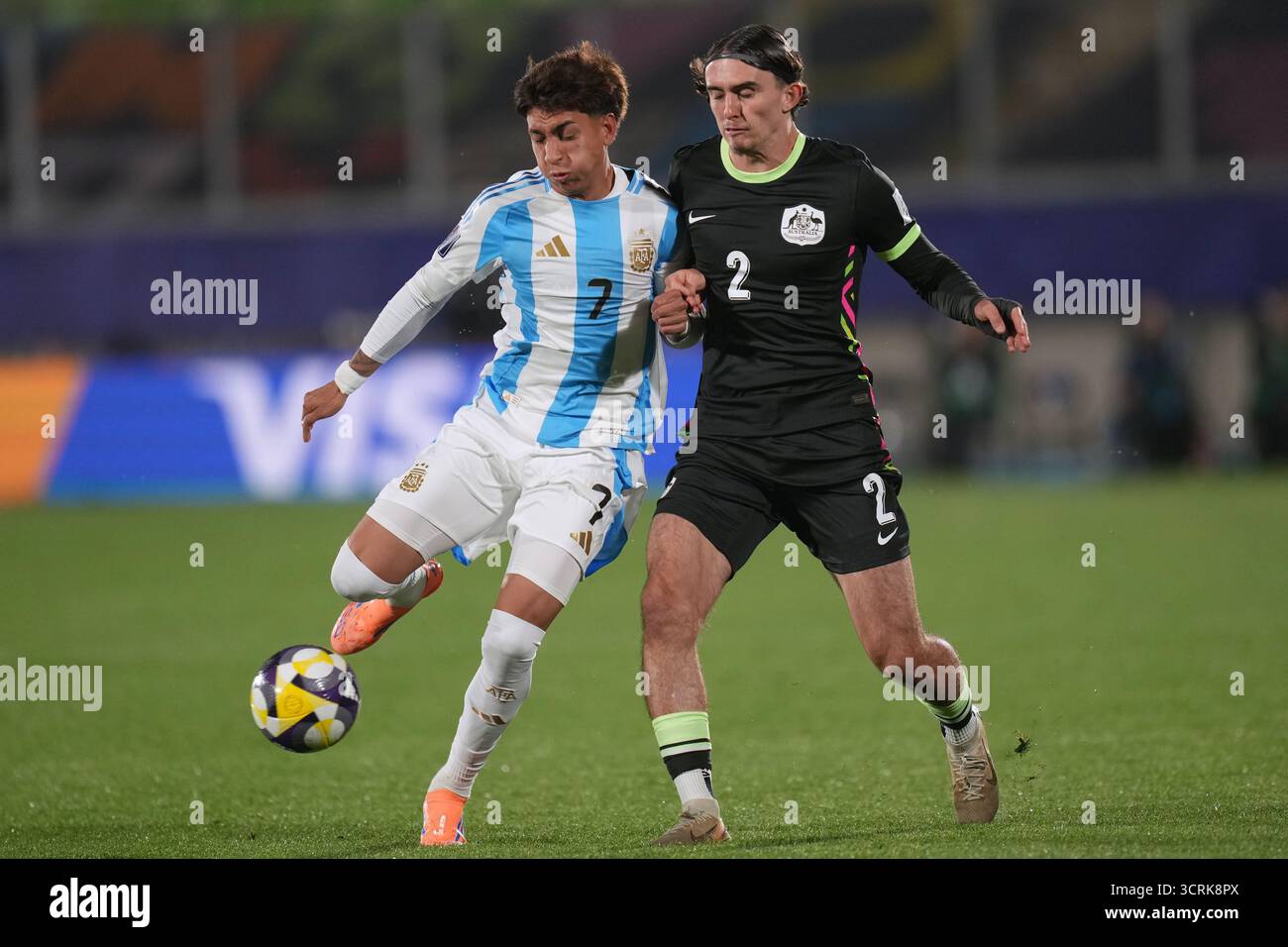 Argentina's Maher Carrizo, left, ad Australia's Daniel Bennie vie for ...