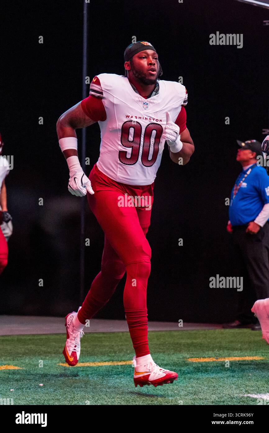 Washington Commanders defensive end Javontae Jean-Baptiste (90) runs ...