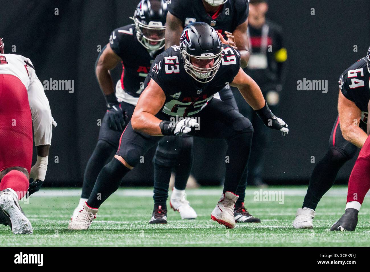Atlanta Falcons guard Chris Lindstrom (63) works during the first half ...