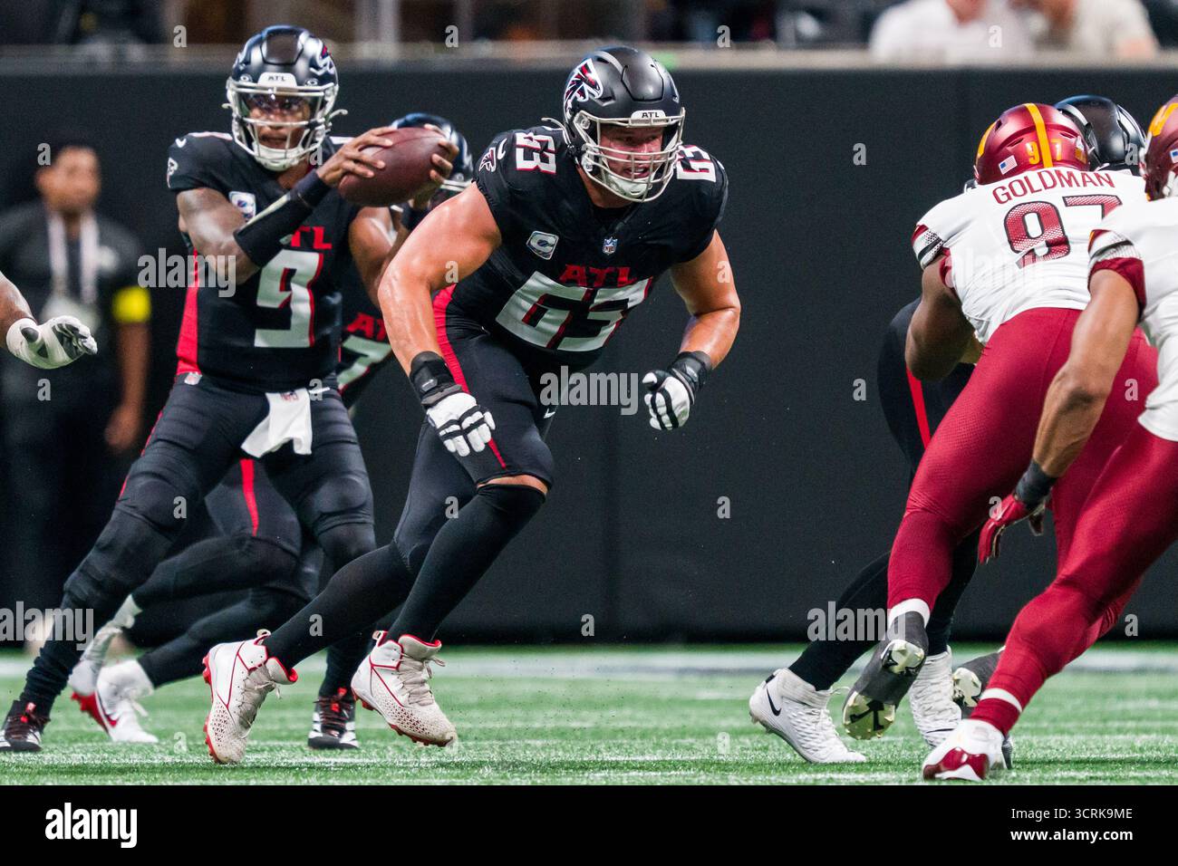 Atlanta Falcons guard Chris Lindstrom (63) works during the first half ...