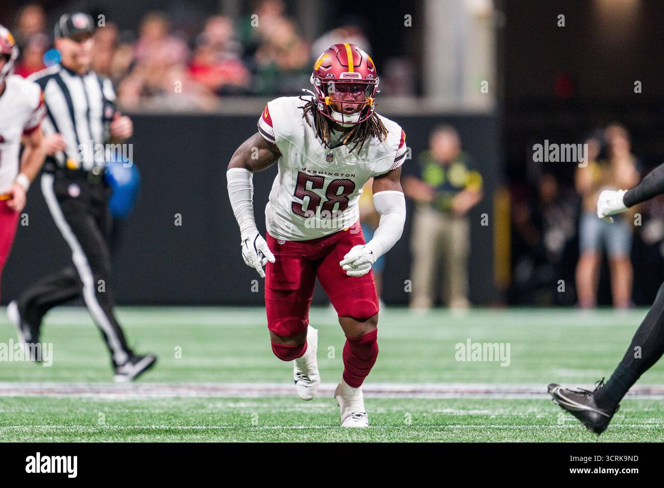 Washington Commanders linebacker Jordan Magee (58) works during the first half of an NFL ...