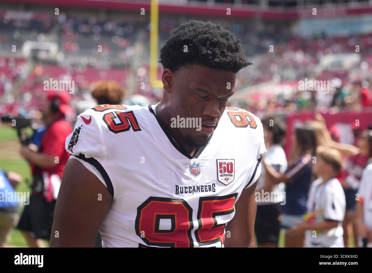 Tampa Bay Buccaneers defensive end Elijah Roberts (95) walks to the ...
