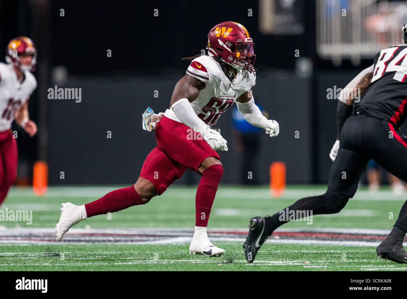 Washington Commanders linebacker Jordan Magee (58) works during the ...
