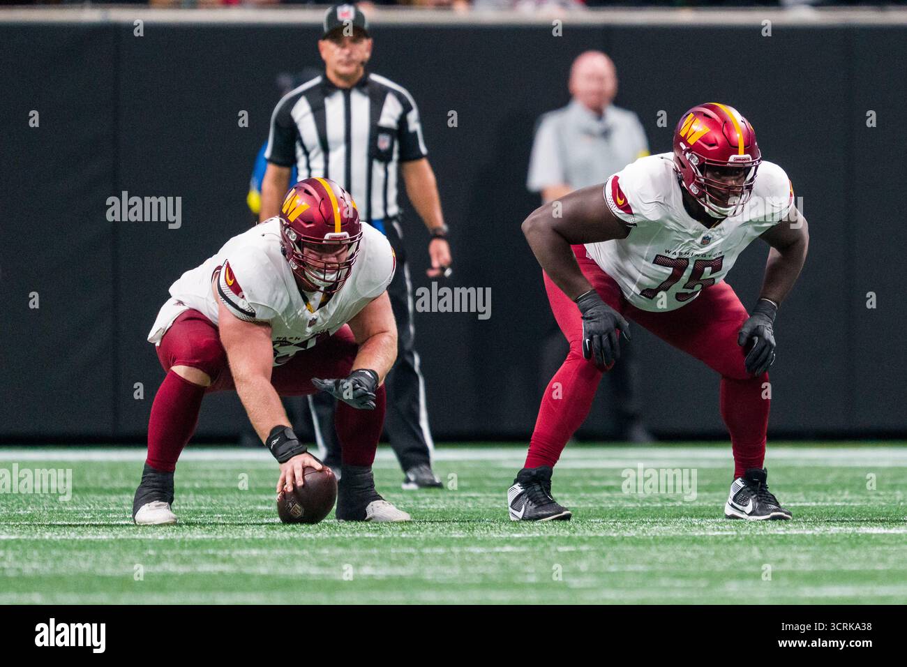 Washington Commanders center Tyler Biadasz (63) and guard Chris Paul ...