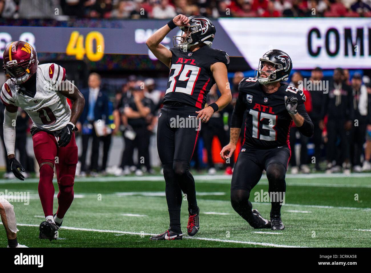 Atlanta Falcons cornerback Keith Taylor (39) kicks during the second ...