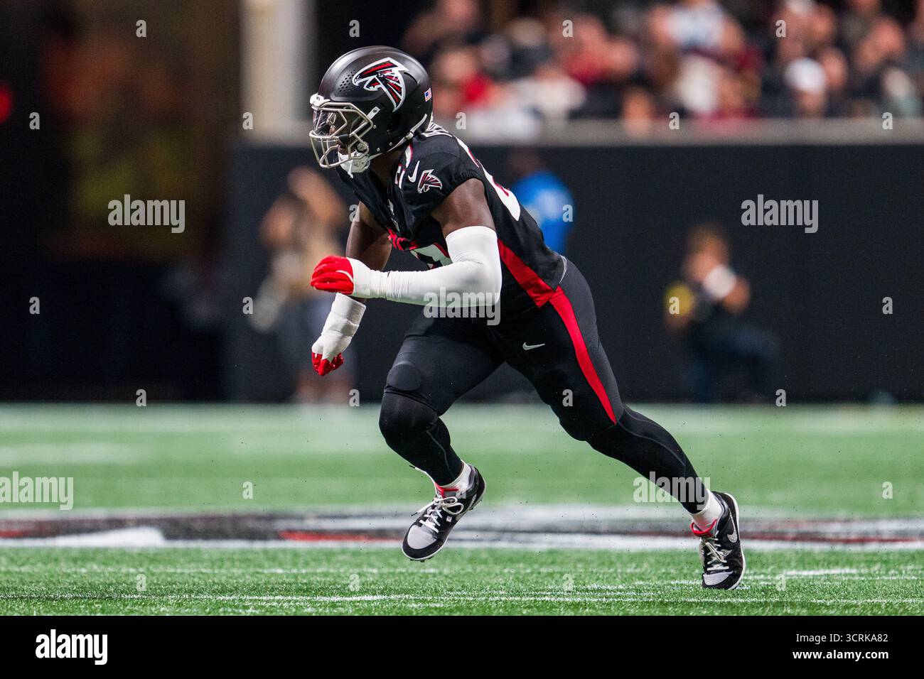 Atlanta Falcons defensive end James Pearce Jr. (27) works during the ...