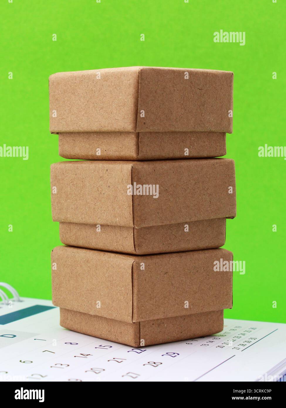 Cardboard boxes on a calendar, delivery date - vertical format Stock ...