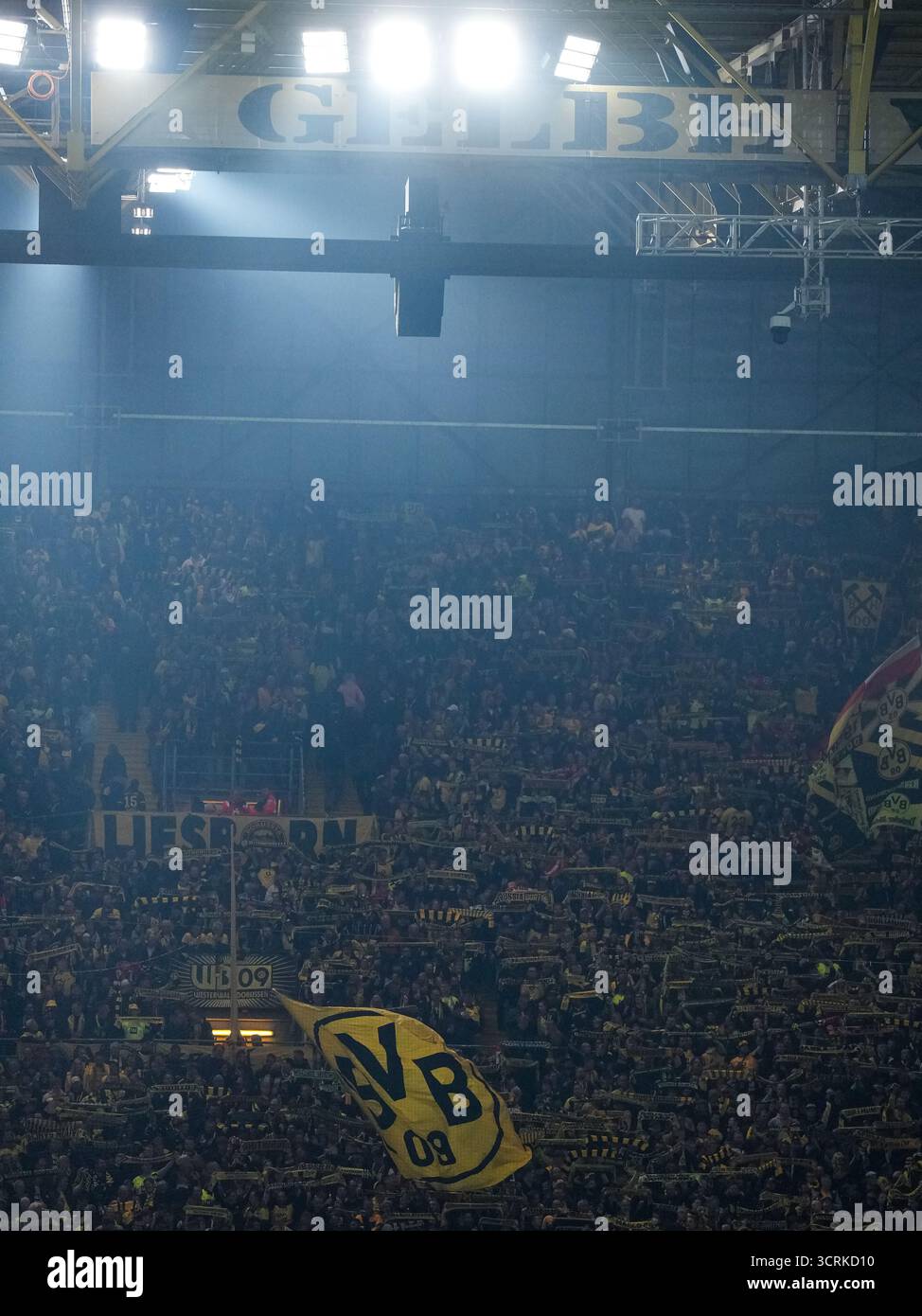 DORTMUND, GERMANY - OCTOBER 1: Borussia Dortmund supporters show their ...