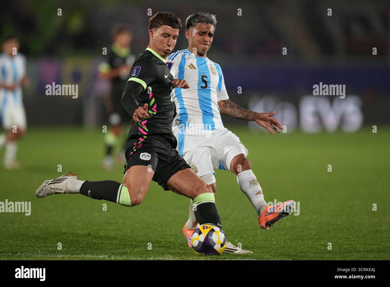 Australia's Louis Agosti moves past Argentina's Milton Delgado during a ...