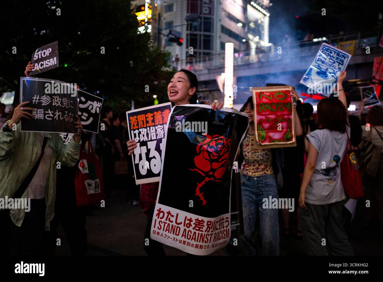 FILE - Demonstrators take part in a 'protest rave' against racism and ...