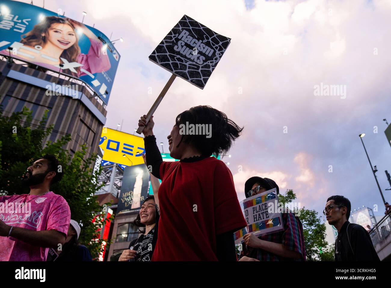 FILE - Demonstrators take part in a 'protest rave' against racism and ...