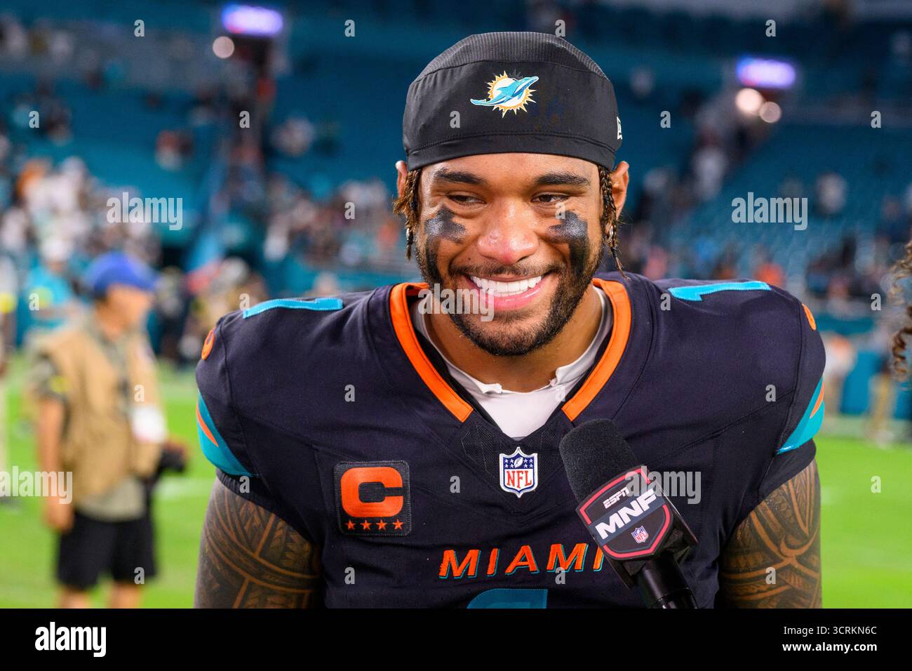 Miami Dolphins quarterback Tua Tagovailoa (1) smiles during a media ...