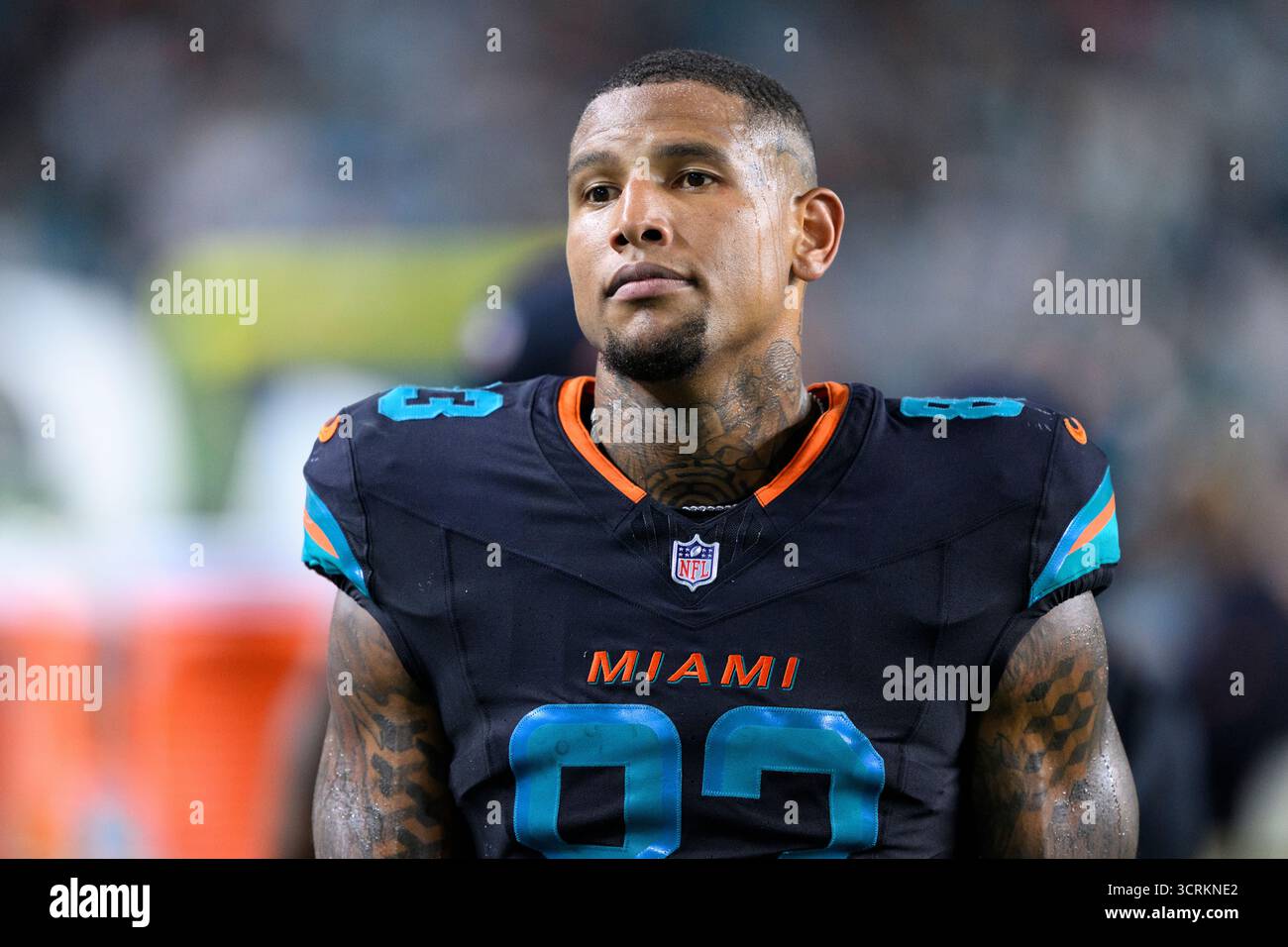 Miami Dolphins tight end Darren Waller (83) stands on the sidelines ...