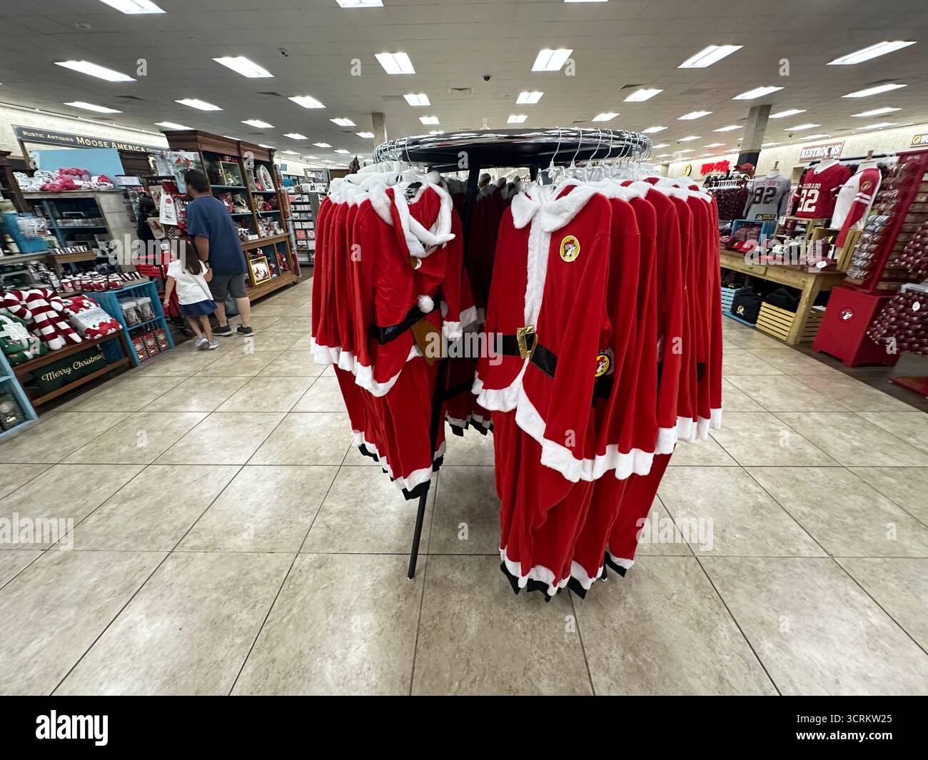 Santa Claus suits are on display in a Buc-ee's store Wednesday, Oct. 1 ...