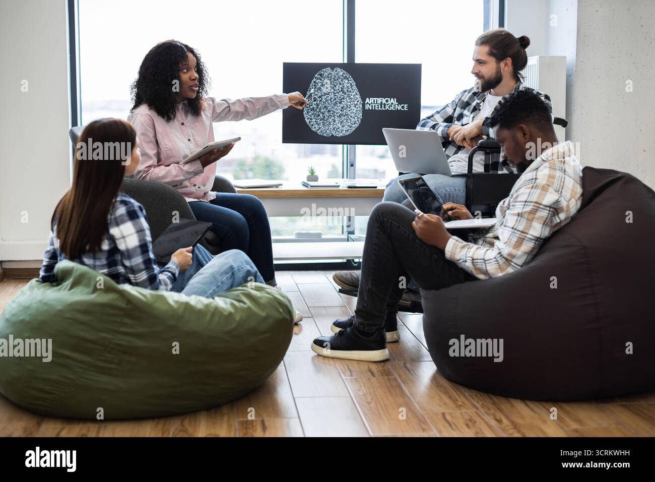 Team discussing artificial intelligence hi-res stock photography and ...