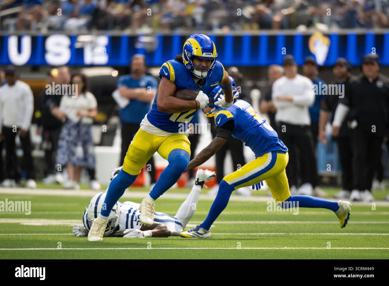 Los Angeles Rams wide receiver Puka Nacua (12) runs with the ball ...