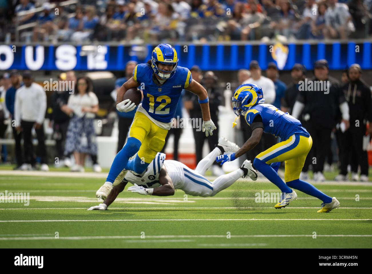 Los Angeles Rams wide receiver Puka Nacua (12) runs with the ball ...