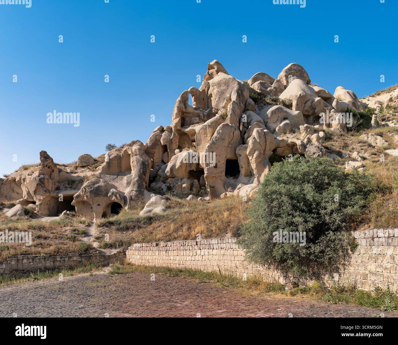 Ancient cave dwellings in the unique fairy chimneys of Goreme ...