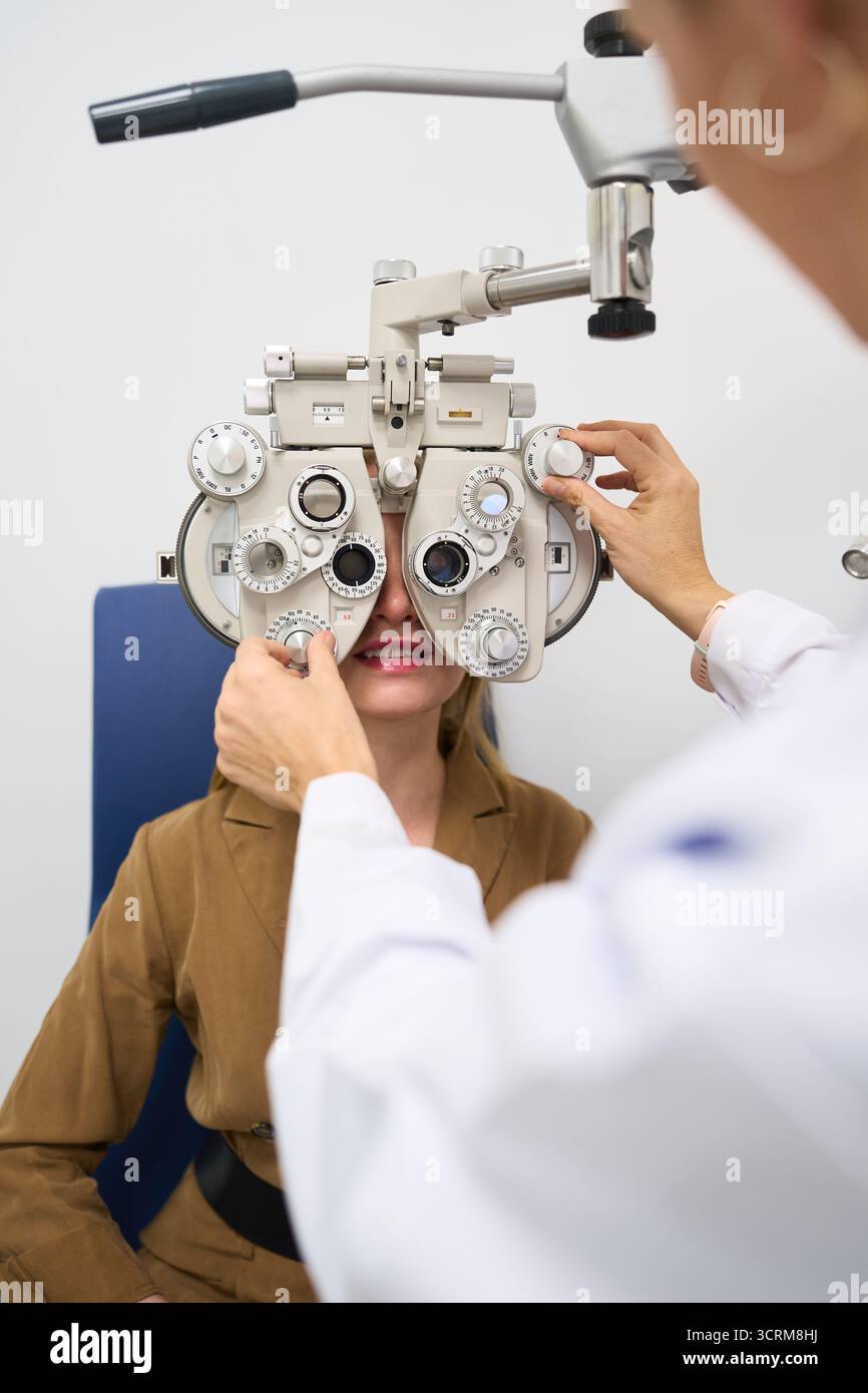 Eyesight exam using modern hi-res stock photography and images - Alamy