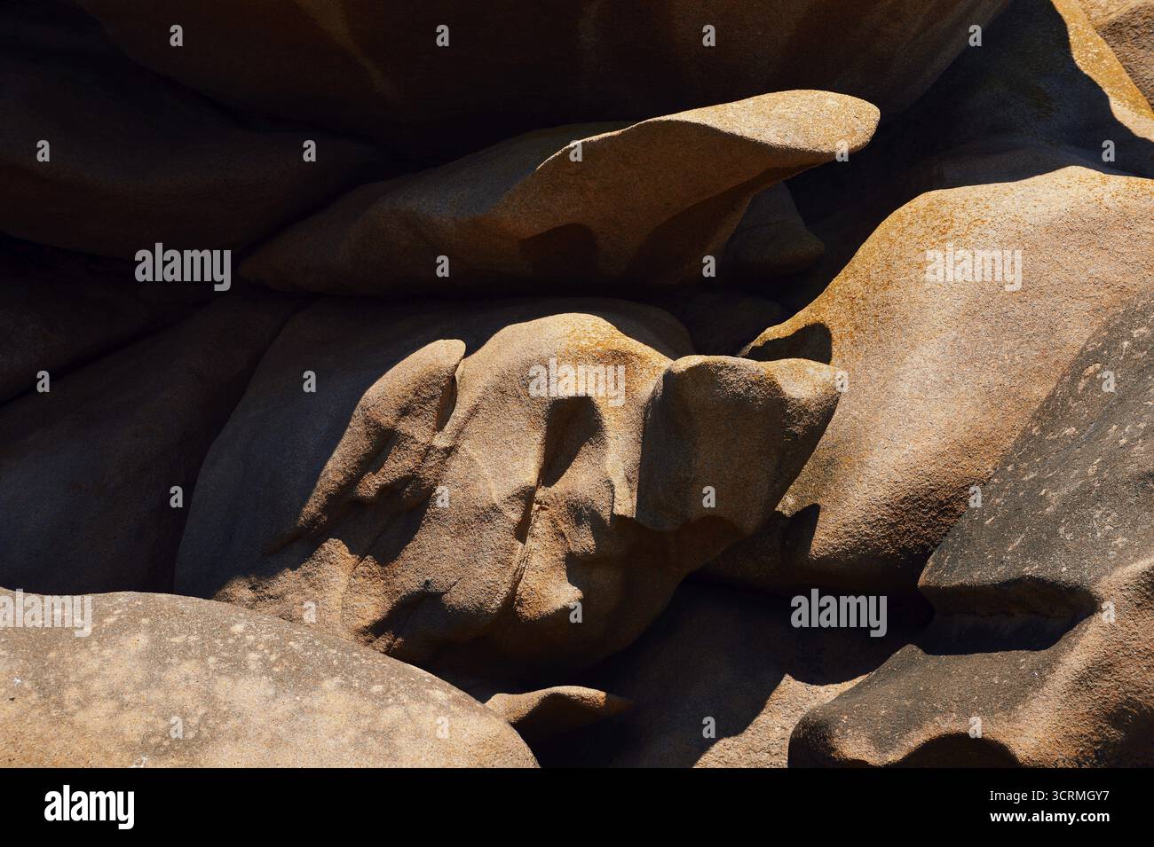 Granite rocks on the Cote de Granit Rose coast near Ploumanac'h, Cotes ...