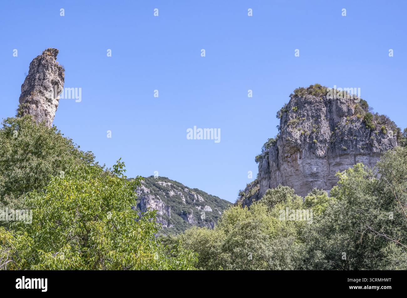 Two prominent dolomite cliffs formed by erosion - a towering peak on ...
