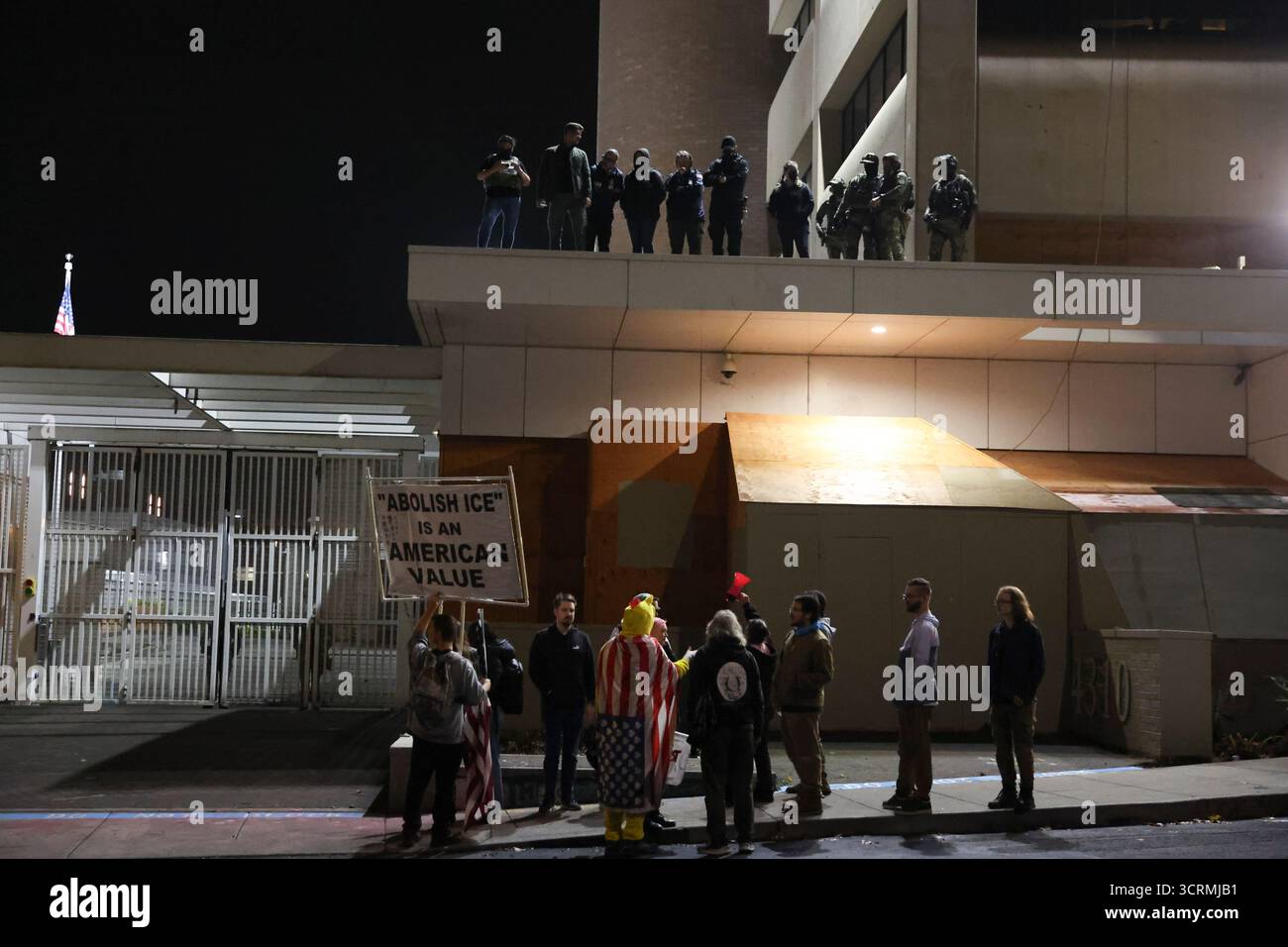 People protest outside a U.S. Immigration and Customs Enforcement ...
