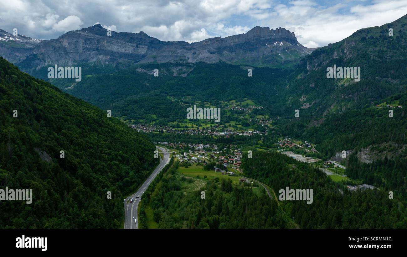 Drone flying through mountains valley hi-res stock photography and ...