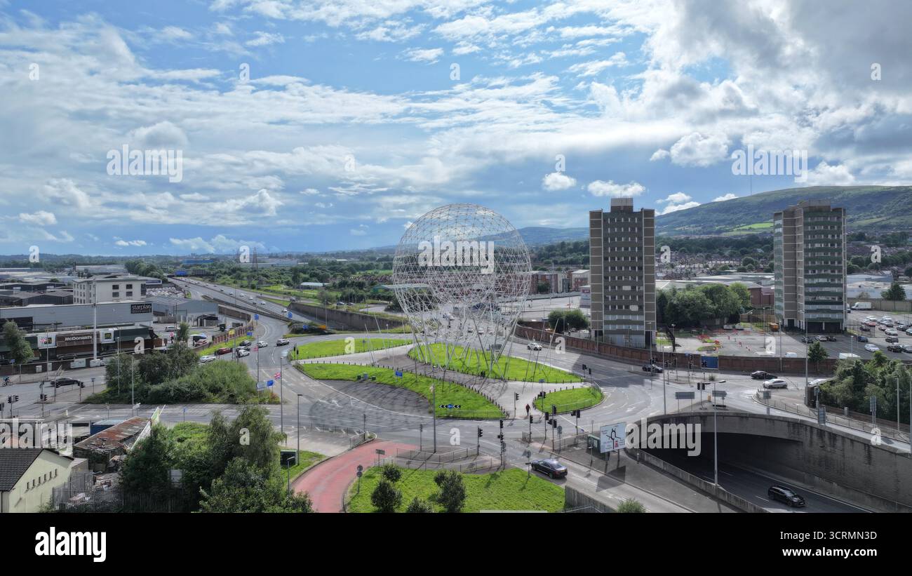 Aerial view of the Rise sculpture gleaming under a vast sky, juxtaposed ...