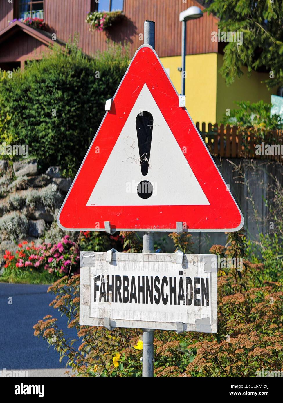 bumps and ground waves ahead traffic sign, warning notice with red ...