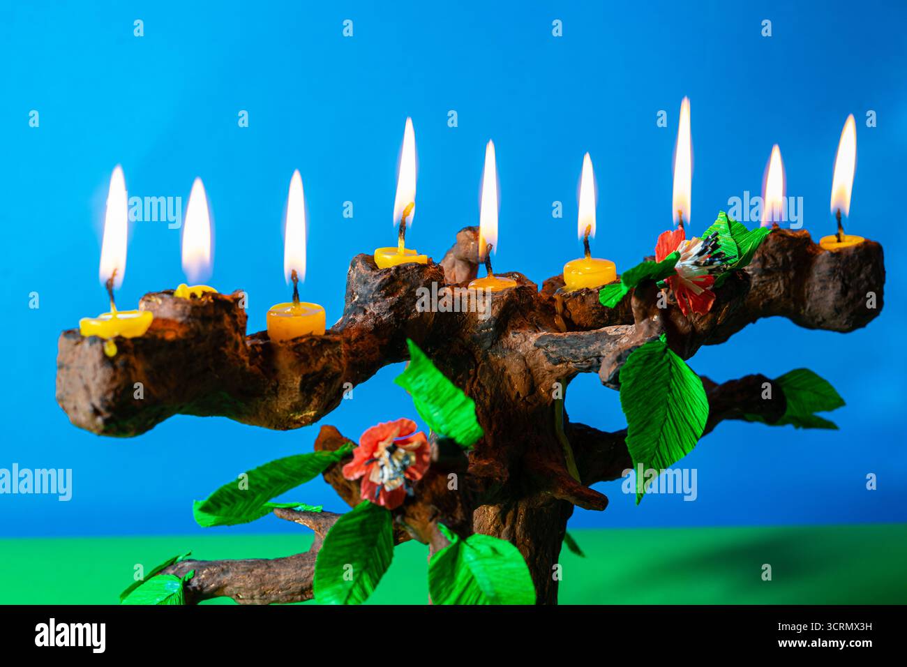 Handmade menorah designed in the shape of a tree, symbolizing the Tu ...