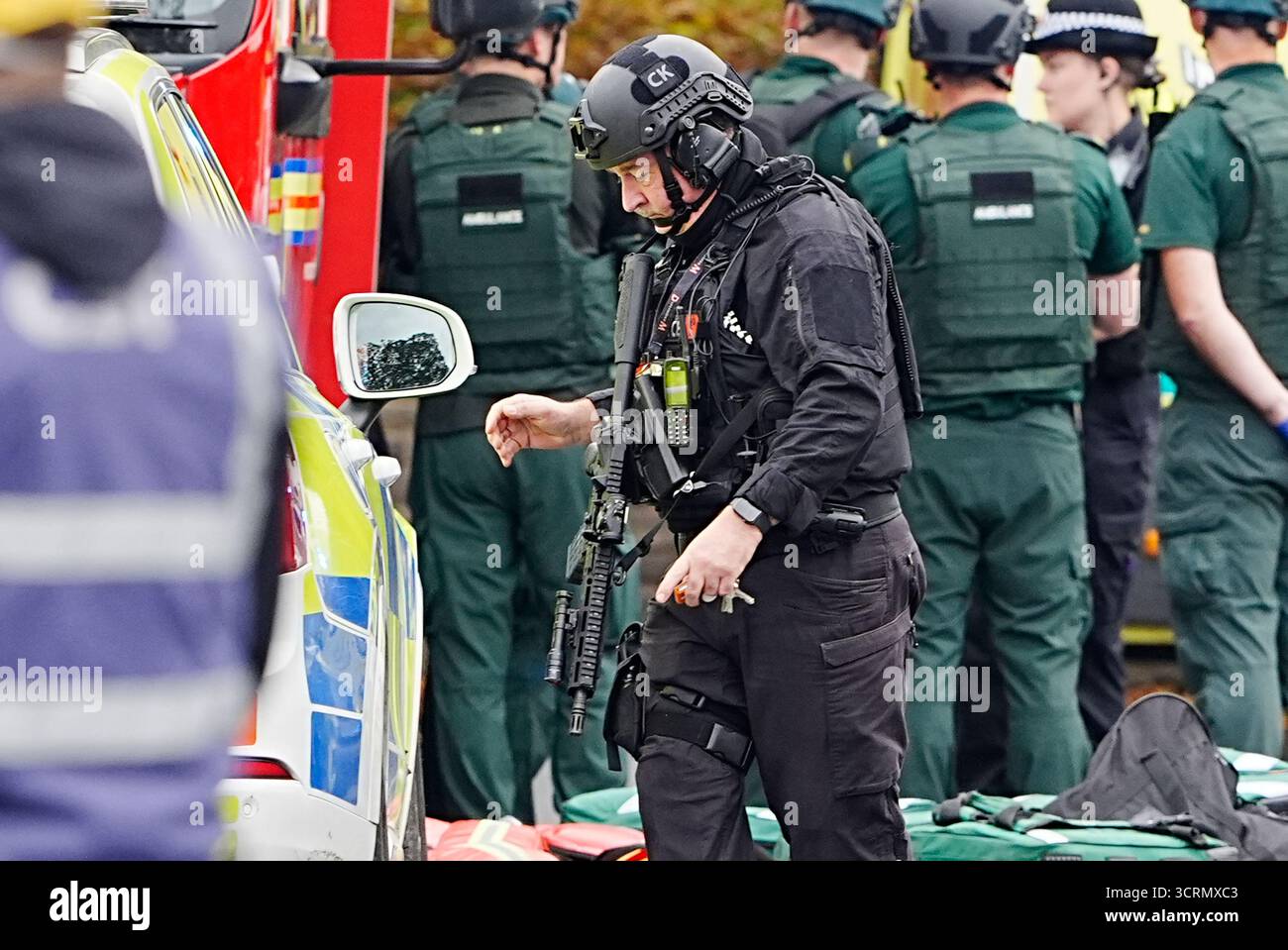 An armed police officer at the scene of an incident at Heaton Park ...