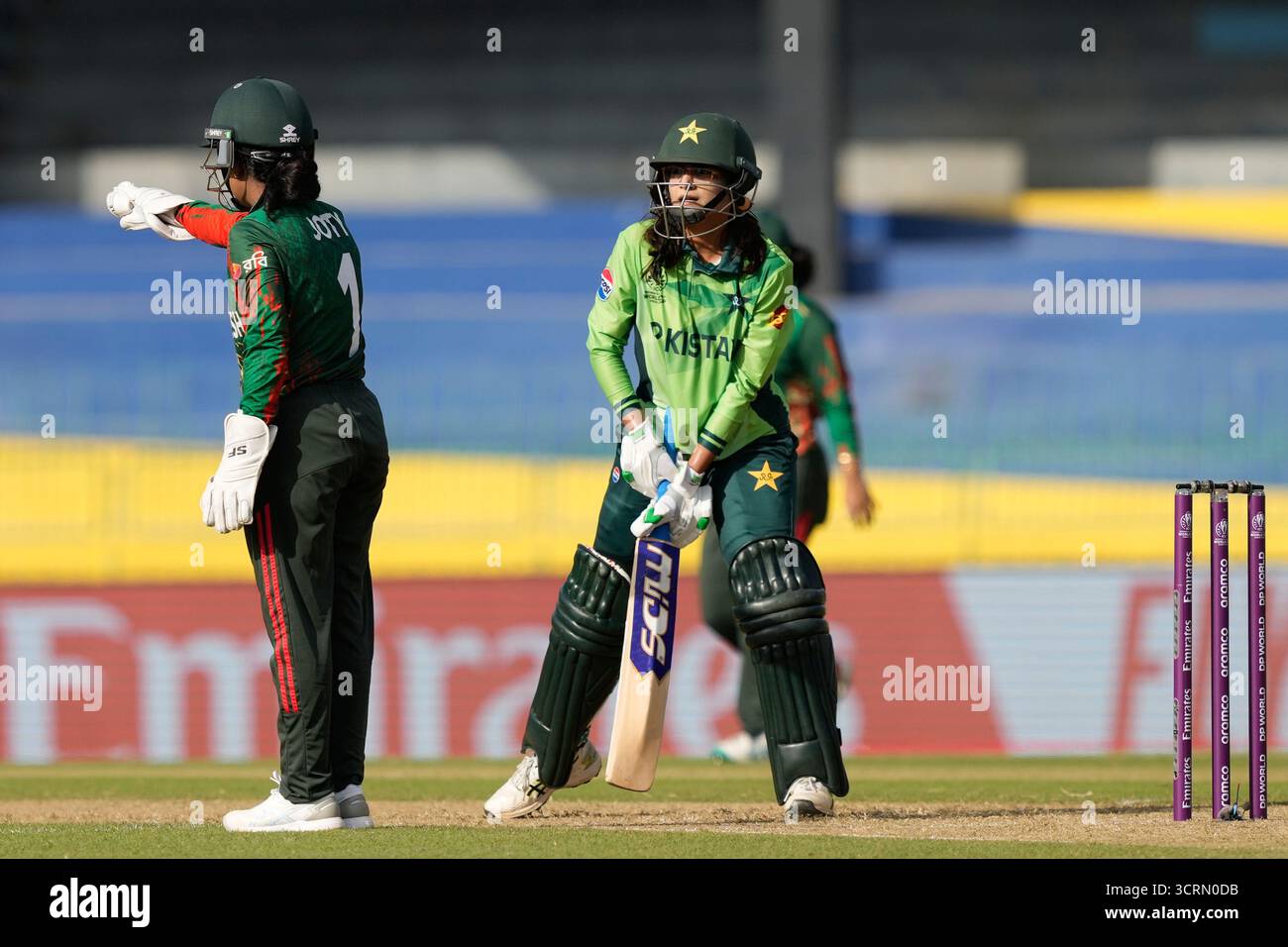 Pakistan's Rameen Shamim, right, reacts after being dismissed during ...