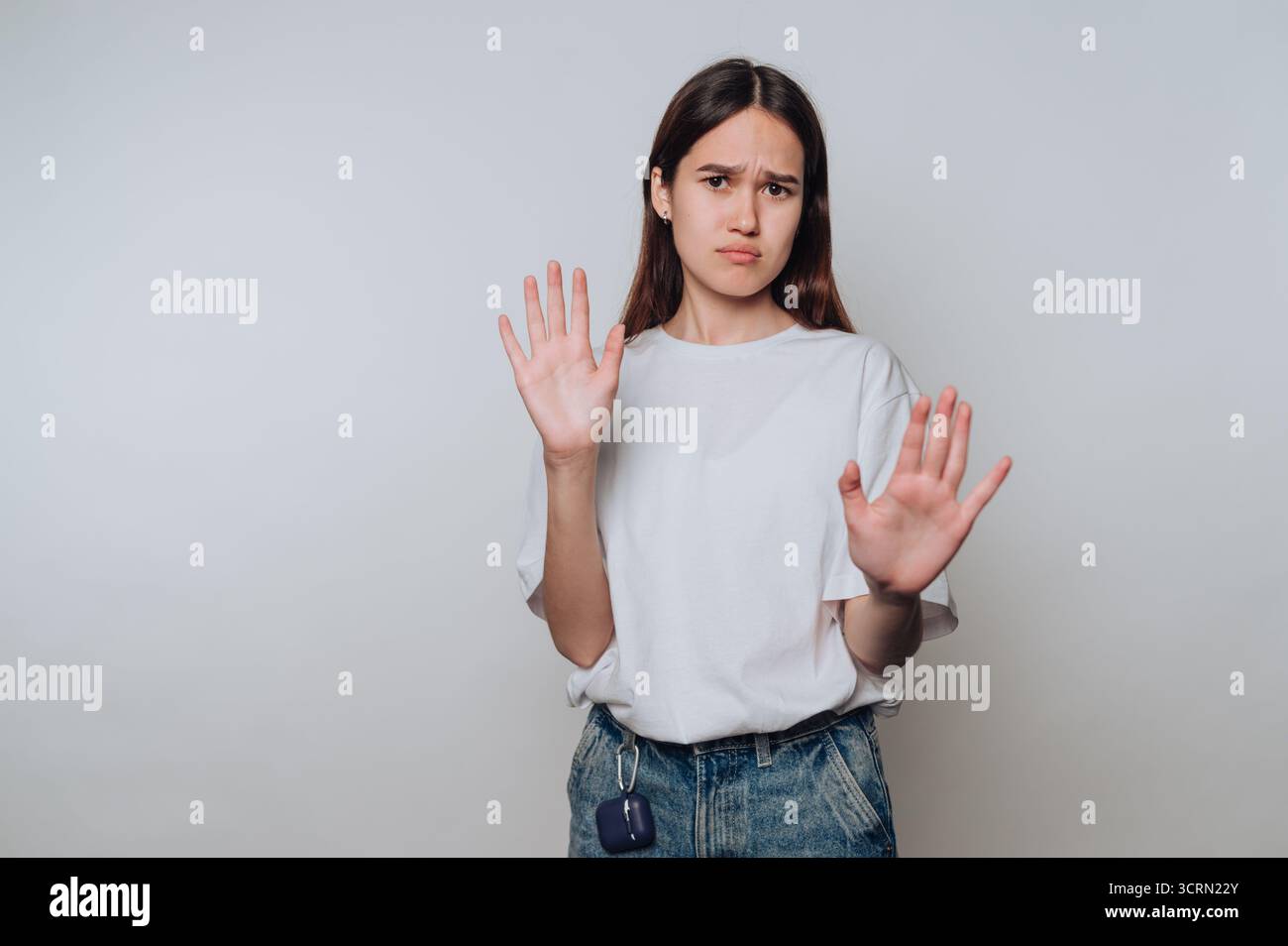 Woman expressing rejection hands raised hi-res stock photography and ...
