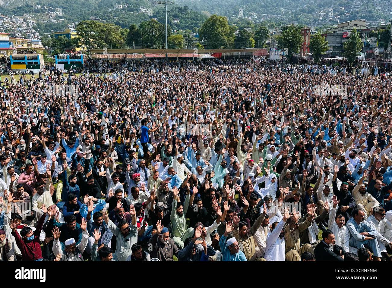 Members of Awami Action Committee chant slogans as they attend the ...
