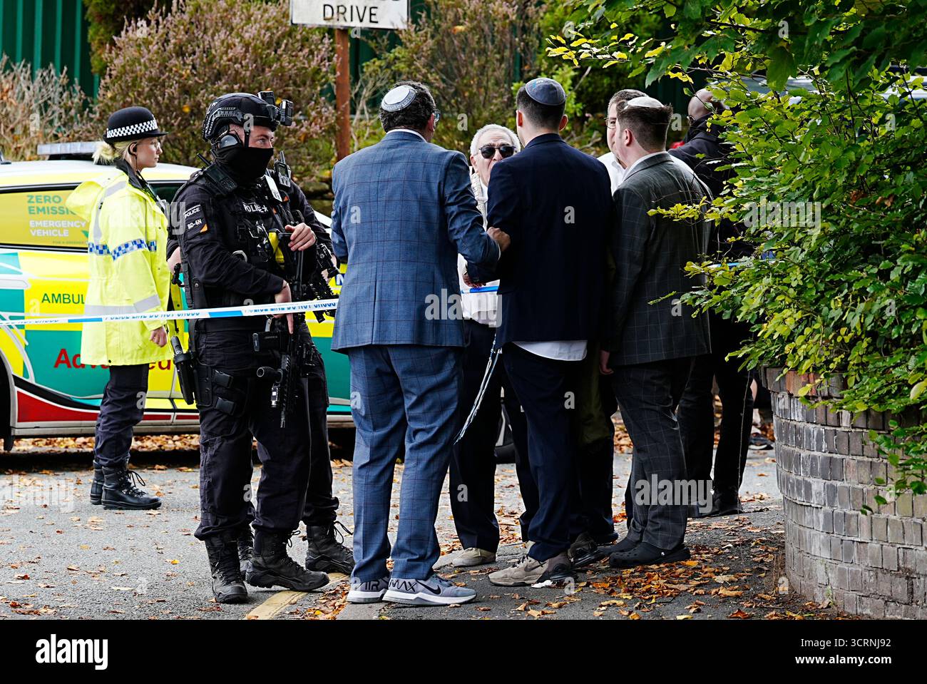 Members of the Jewish community speaks to officers at the cordon near ...